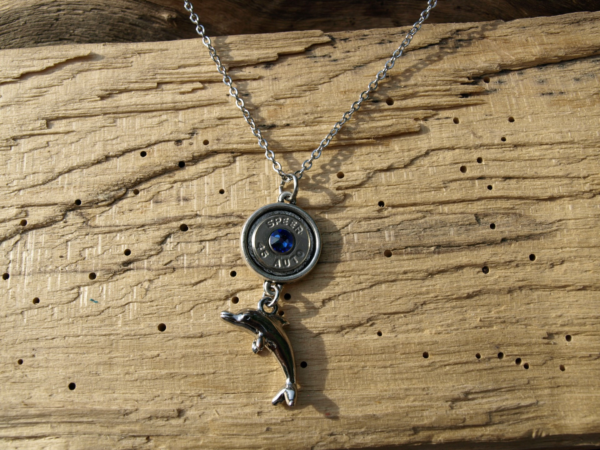 NS-6018 Dolphin Bullet Necklace. Your choice of Nickel or Brass 45 Auto ...